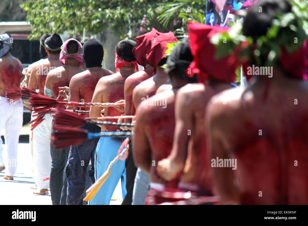 A flagellant's in Brgy. Cutud, San Fernando, Pampanga perform their act of penance as self ...