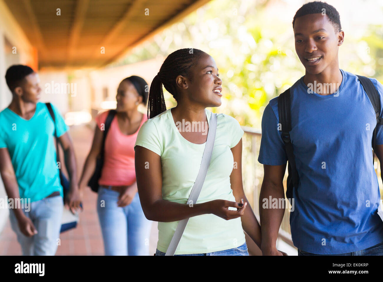 College students walking holding hands hi-res stock photography and ...