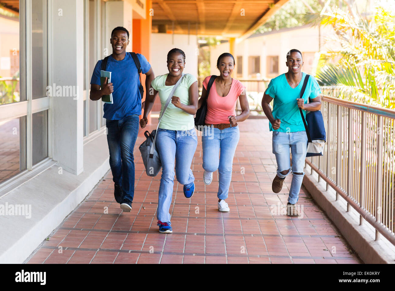 cheerful African college students running to lecture hall Stock Photo ... cheerful African college students running to lecture hall Stock Photo ...