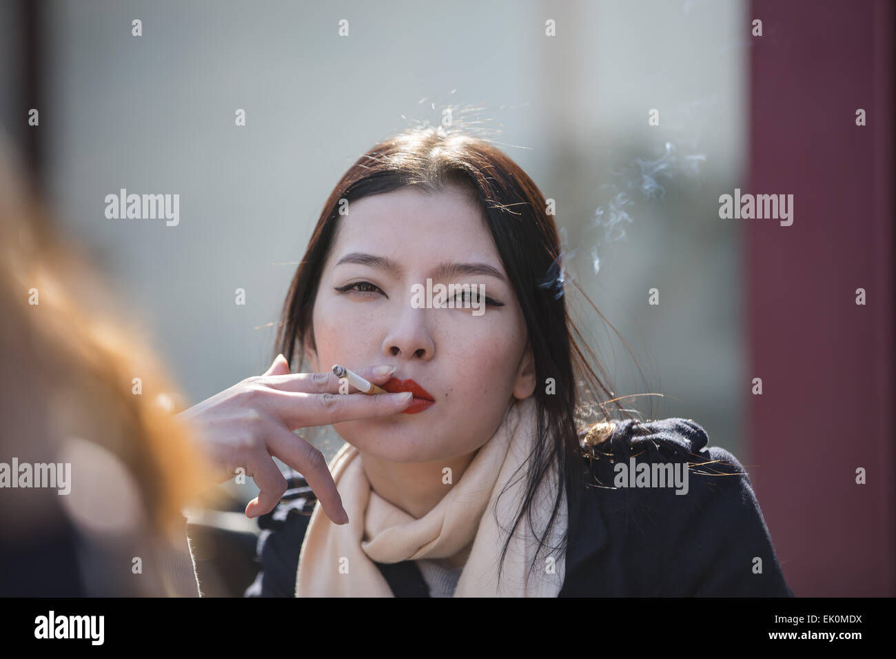 Chinese girl smoking hi-res stock photography and images - Alamy