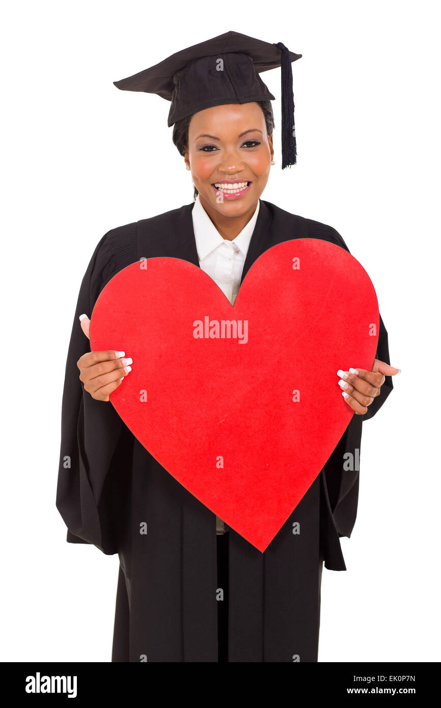 happy young African American college graduate holding heart shape over ...