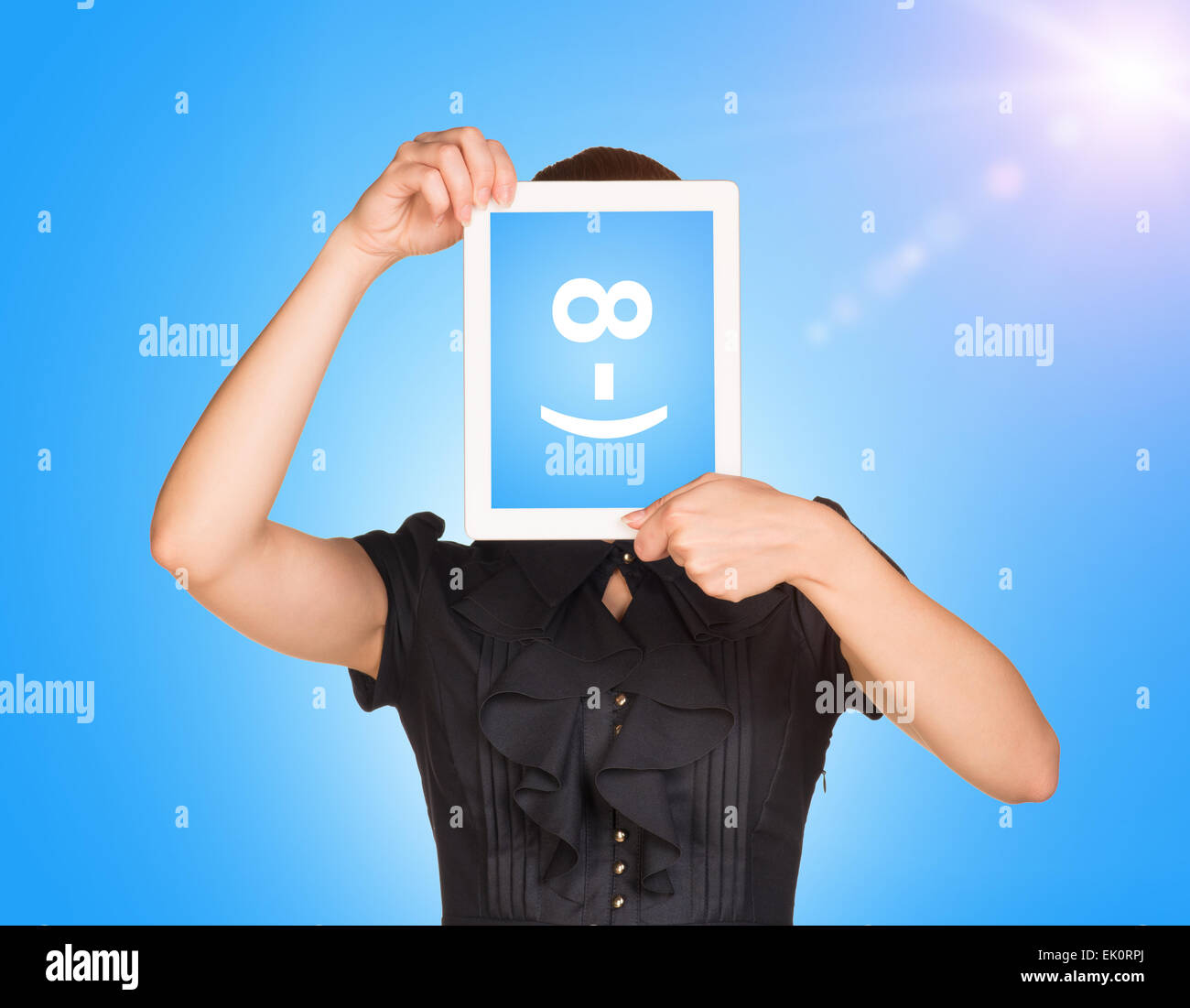 Girl in dress covered her face with tablet. On screen code smiley Stock ...