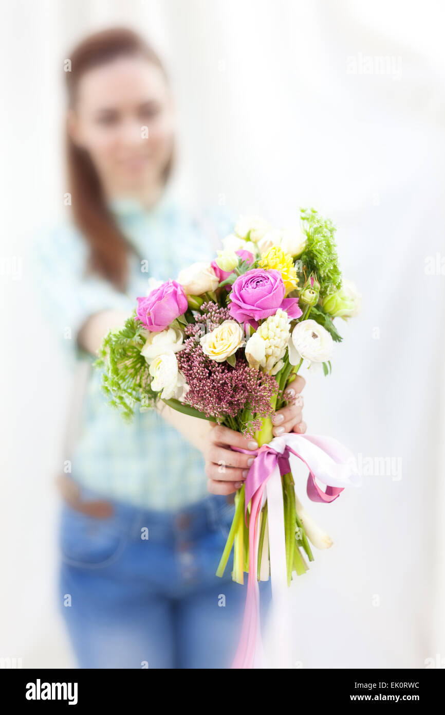 Bunch of random flowers closeup in florist's hands Stock Photo - Alamy