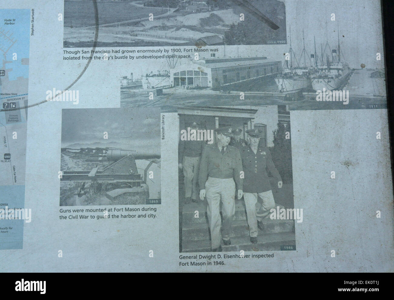 Information board photographs of gun emplacement, army transport ships ...