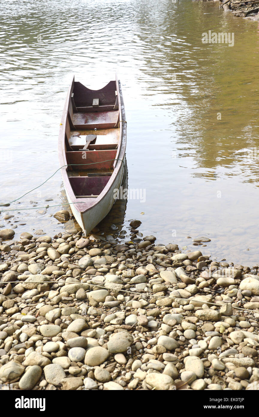 wooden boat on the river Stock Photo - Alamy