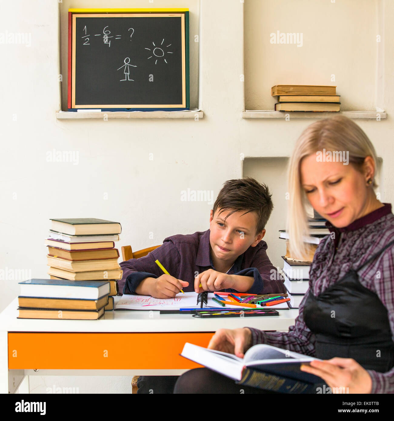 Adult tutor hi-res stock photography and images - Alamy