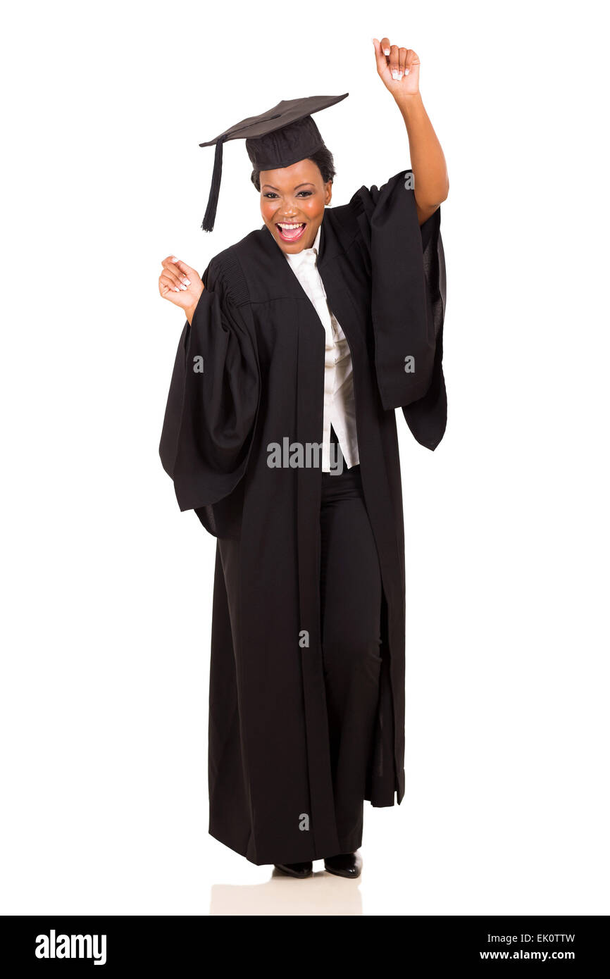 happy young African female university graduate dancing on white ...