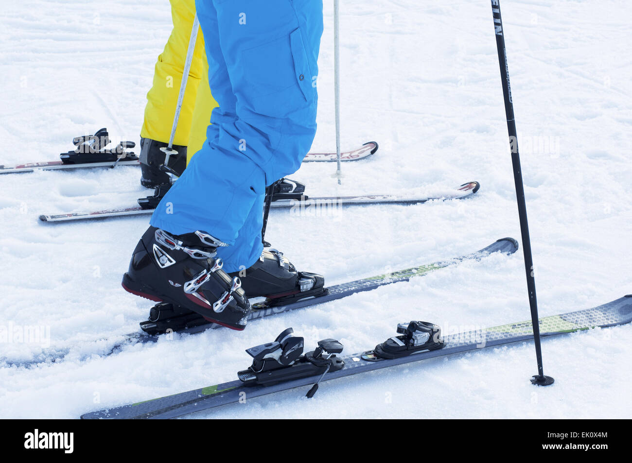 Ski boots and skis Stock Photo - Alamy
