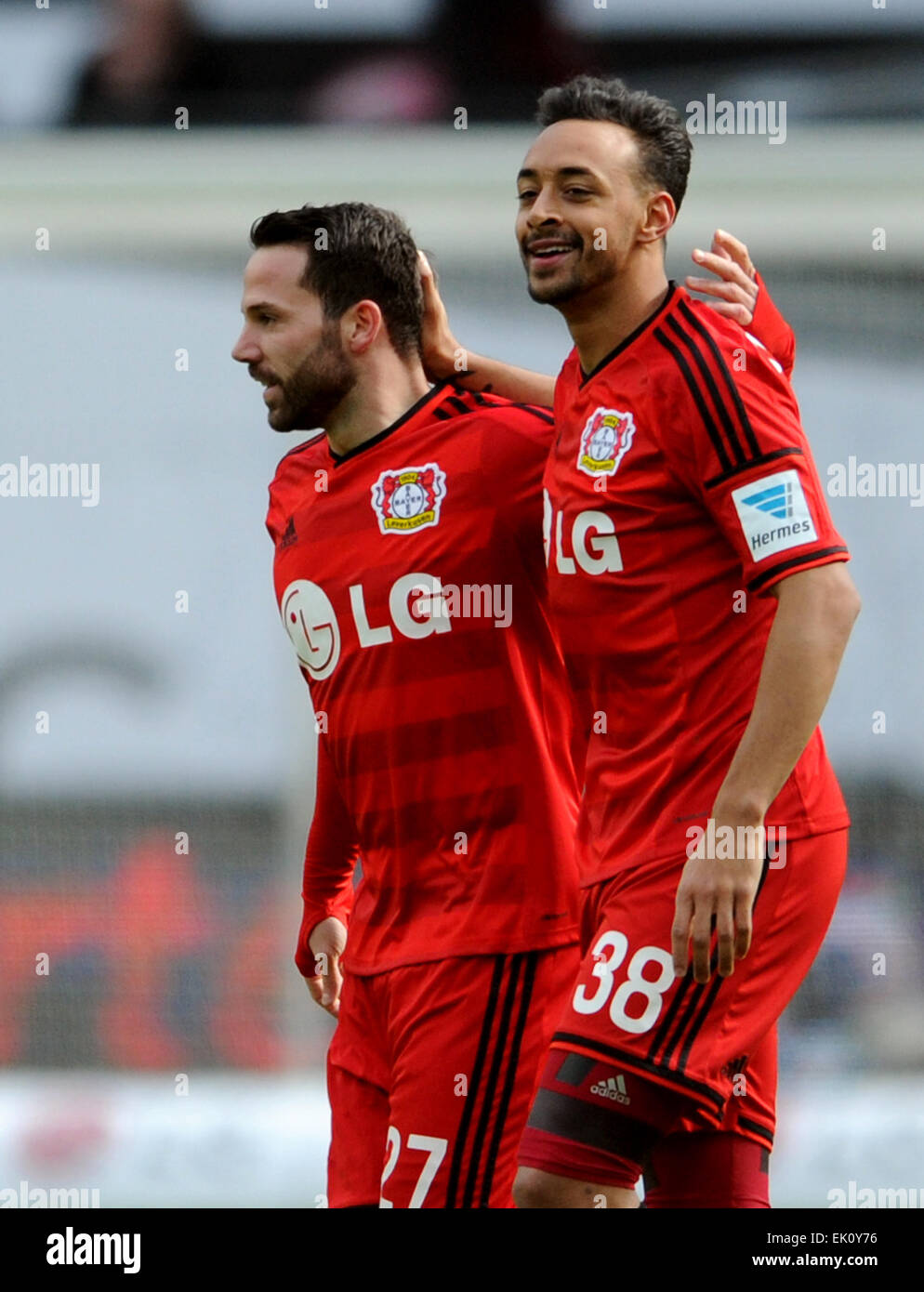 Leverkusen's goal scorer Gonzalo Castro (l) and Karim Bellarabi (r ...