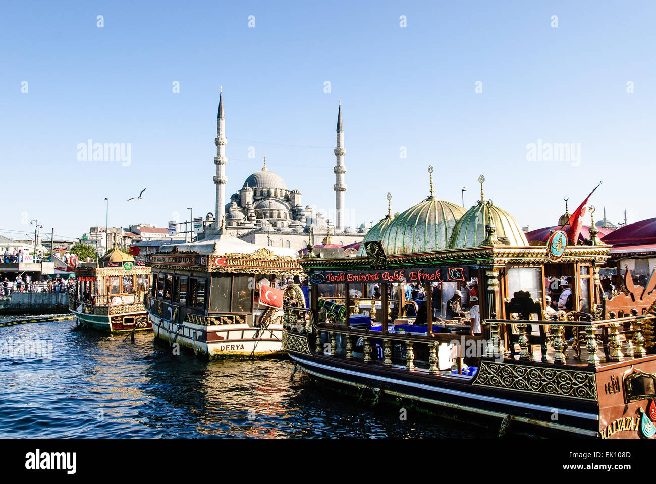 Restaurant boats in front of the Suleymaniye Mosque on the Bosphorous ...