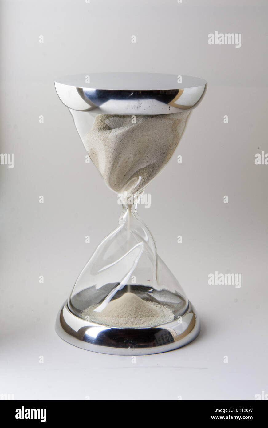 hourglass closeup with twisted glass and steel closure Stock Photo - Alamy