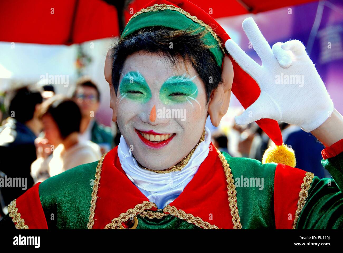 Hong Kong, China: Smiling actor dressed as an elf for the Christmas ...