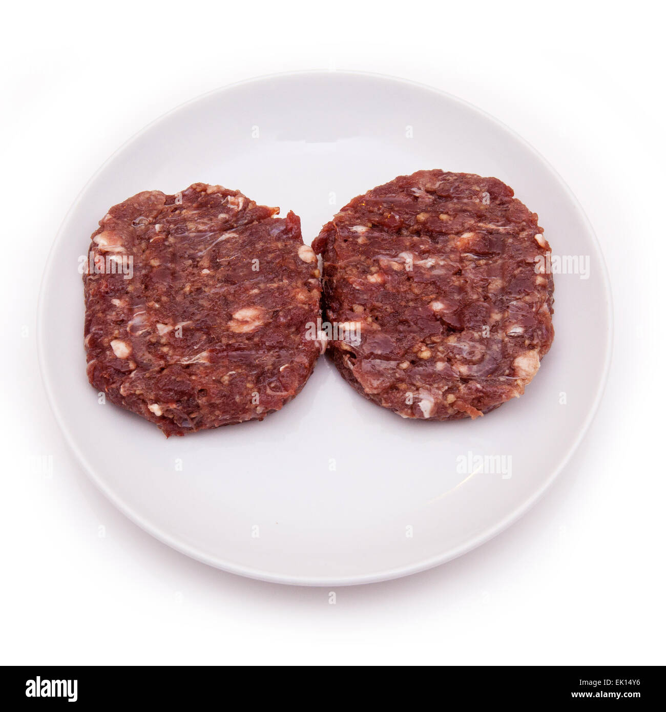 Kangaroo meat burgers uncooked isolated on a white studio background ...