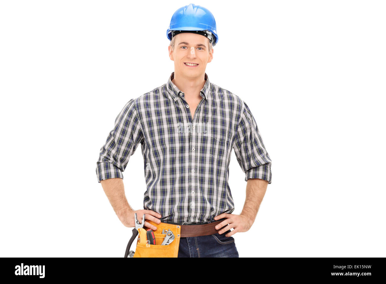 Confident construction guy in uniform wearing blue helmet and posing ...