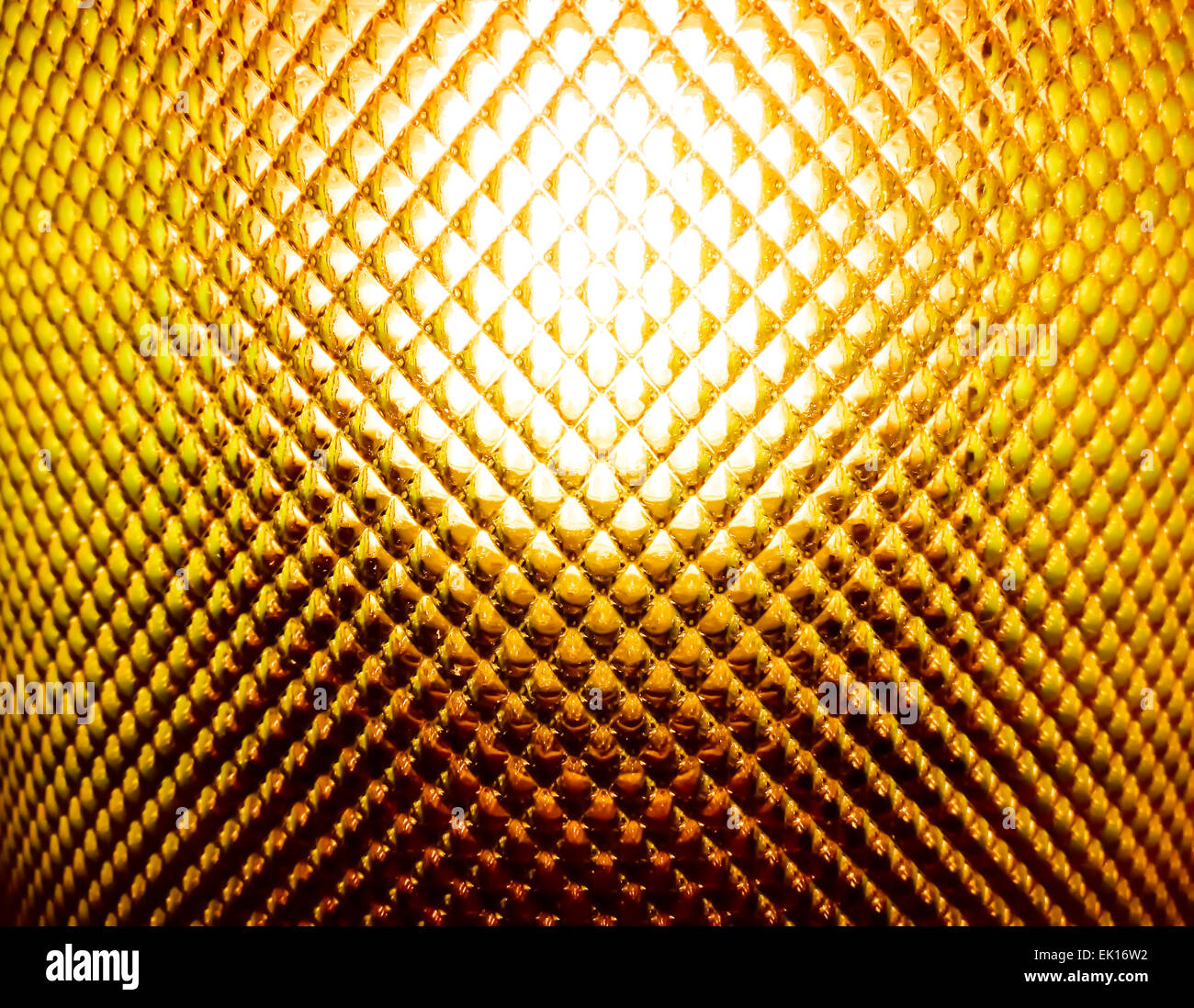 Yellow textured back lighted of glass lamp cover Stock Photo - Alamy