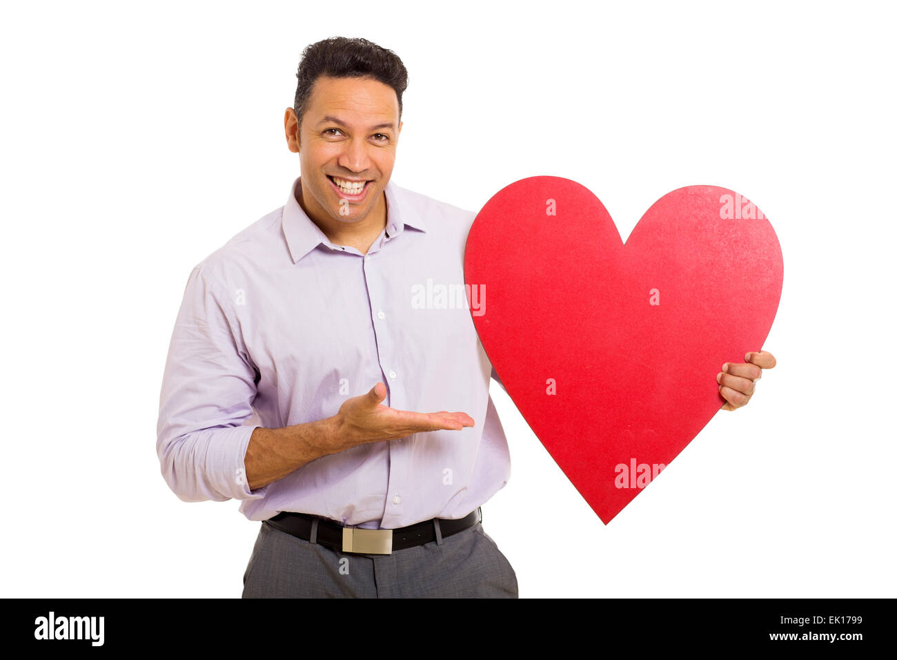 cheerful mid age man presenting red heart shape on white background ...