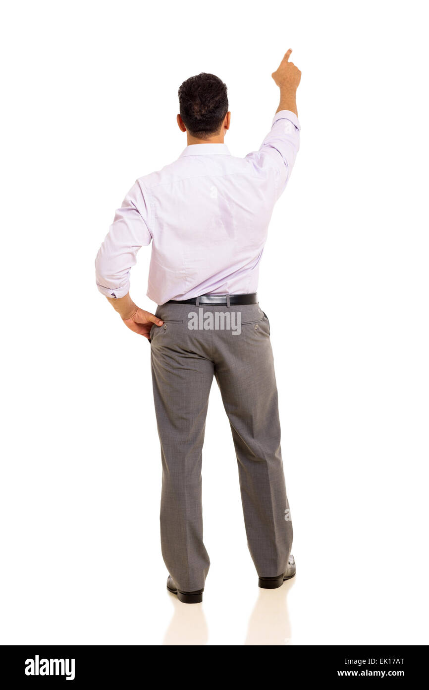 rear view of man pointing at empty copy space isolated on white Stock ...