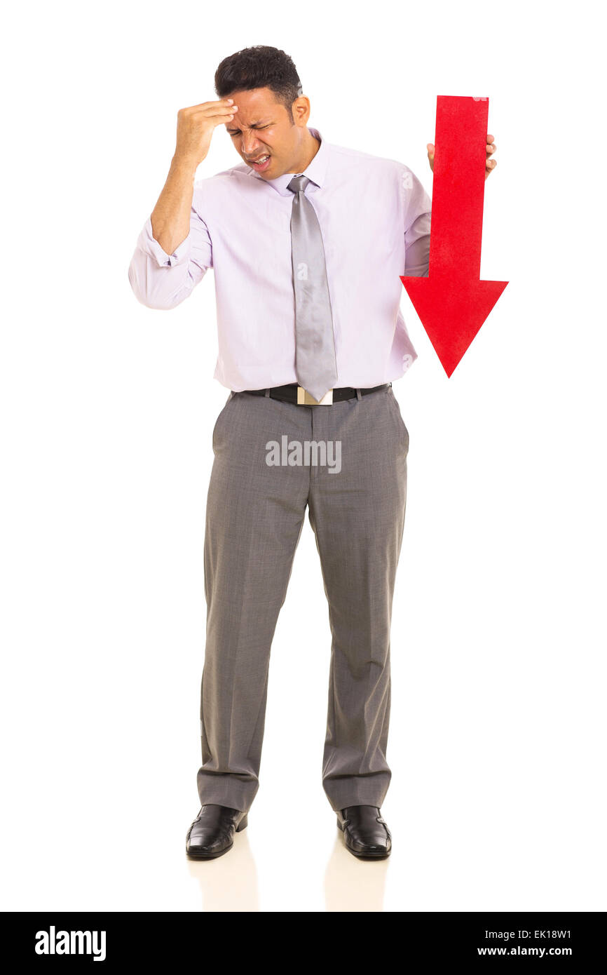 stressed mature businessman holding arrow pointing down on white ...