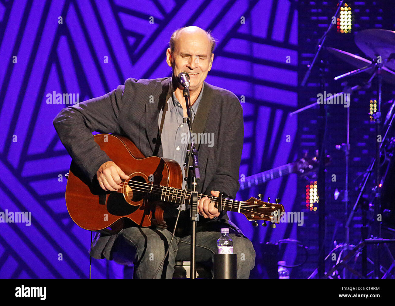 James Taylor performing live on stage at Manchester Phones4U Arena ...