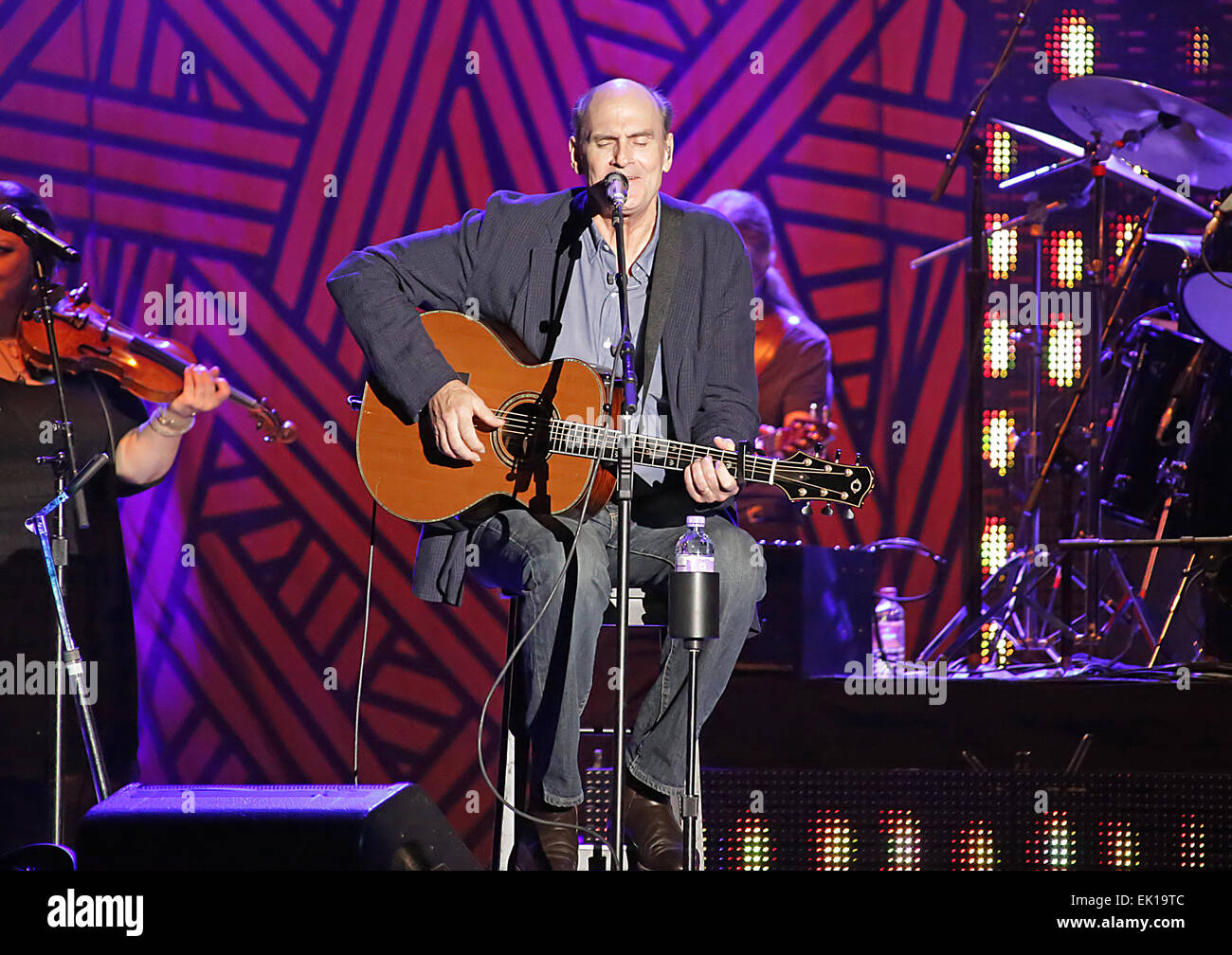 James Taylor performing live on stage at Manchester Phones4U Arena ...