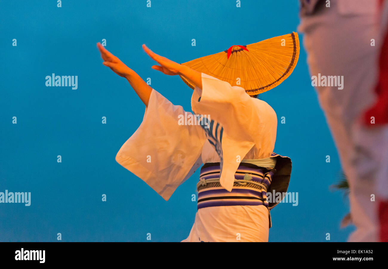 Ama woman in traditional clothing and hat dancing at Shirahama Ama ...