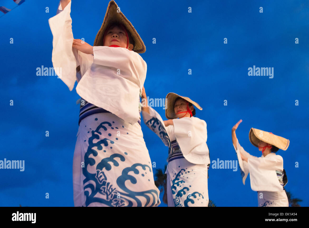 Ama woman in traditional clothing and hat dancing at Shirahama Ama ...
