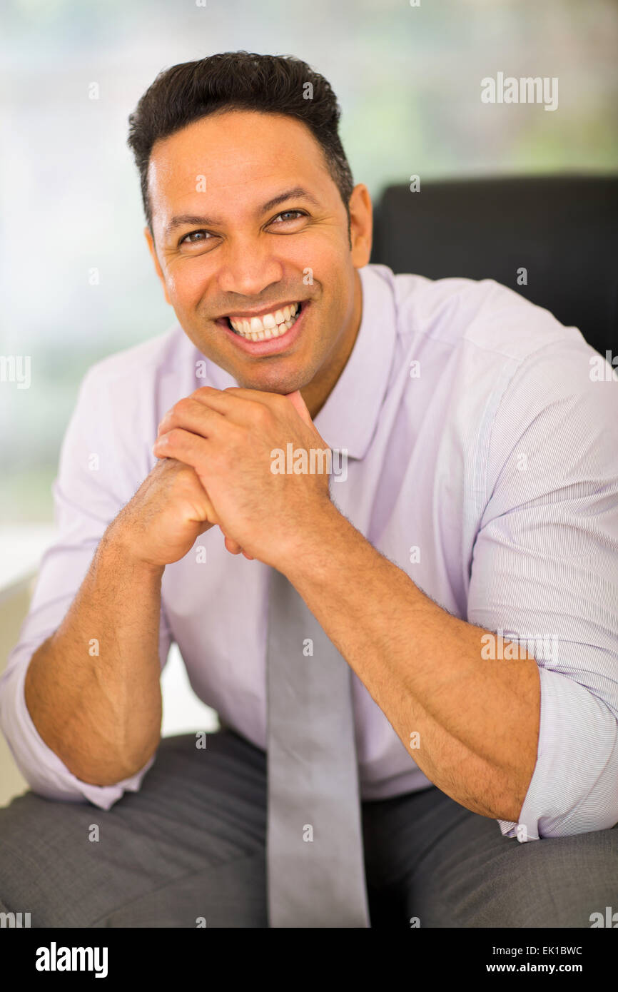 handsome Caucasian businessman sitting in office Stock Photo - Alamy handsome Caucasian businessman sitting in office Stock Photo - Alamy