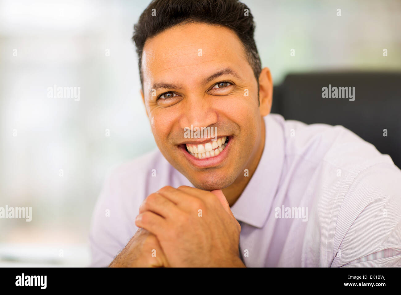 Modern businessman smiling camera close hi-res stock photography and ...