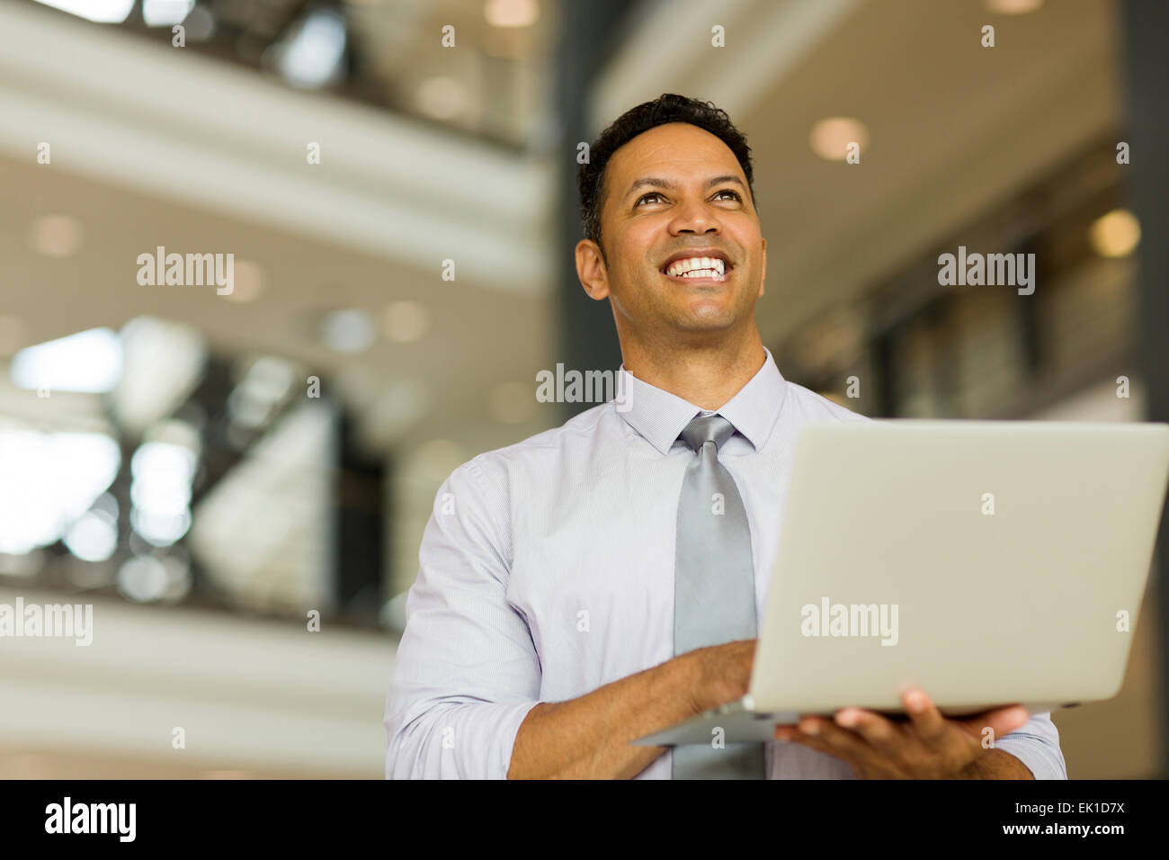 handsome businessman with laptop computer Stock Photo - Alamy