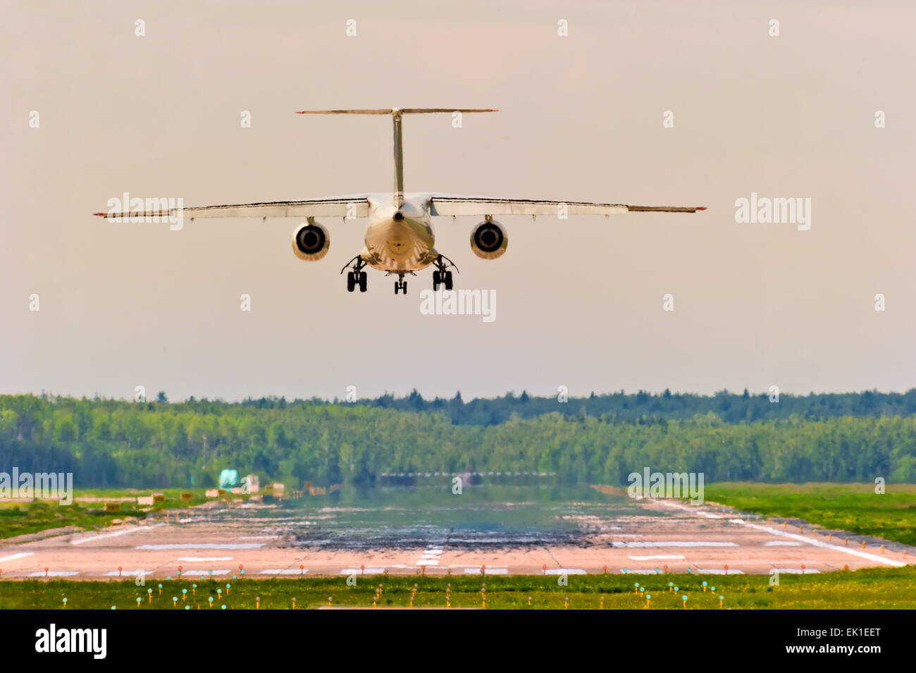 departing from an airport plane with landing gear Stock Photo - Alamy
