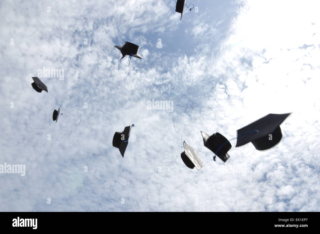 Graduation hat thrown hi-res stock photography and images - Alamy