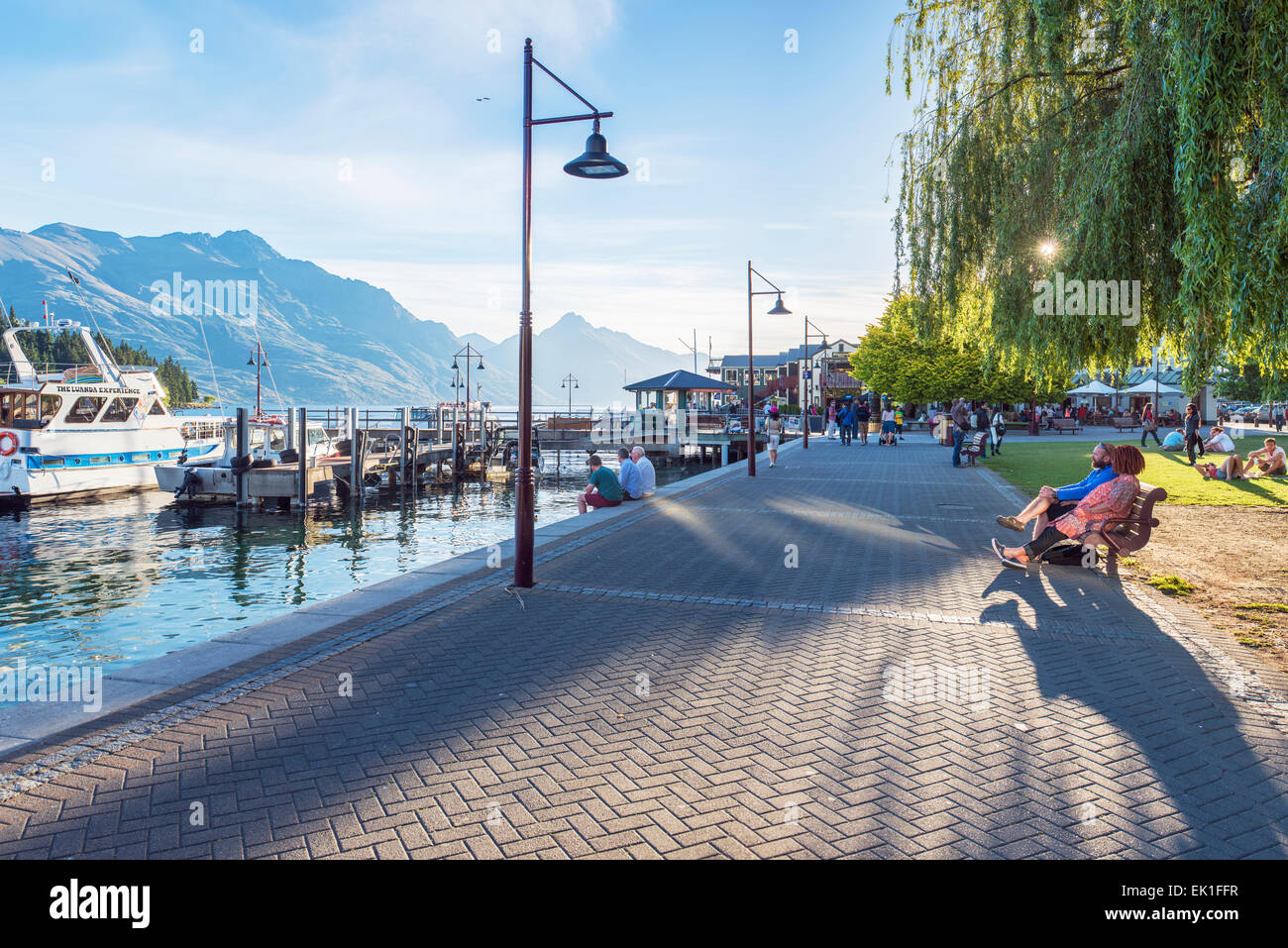 Queenstown waterfront in late afternoon summer sun Stock Photo - Alamy