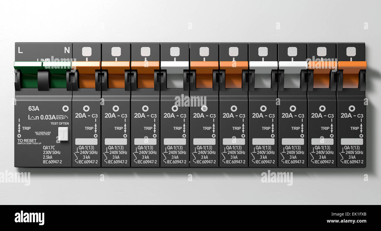 A row of switched on household electrical circuit breakers on a wall ...