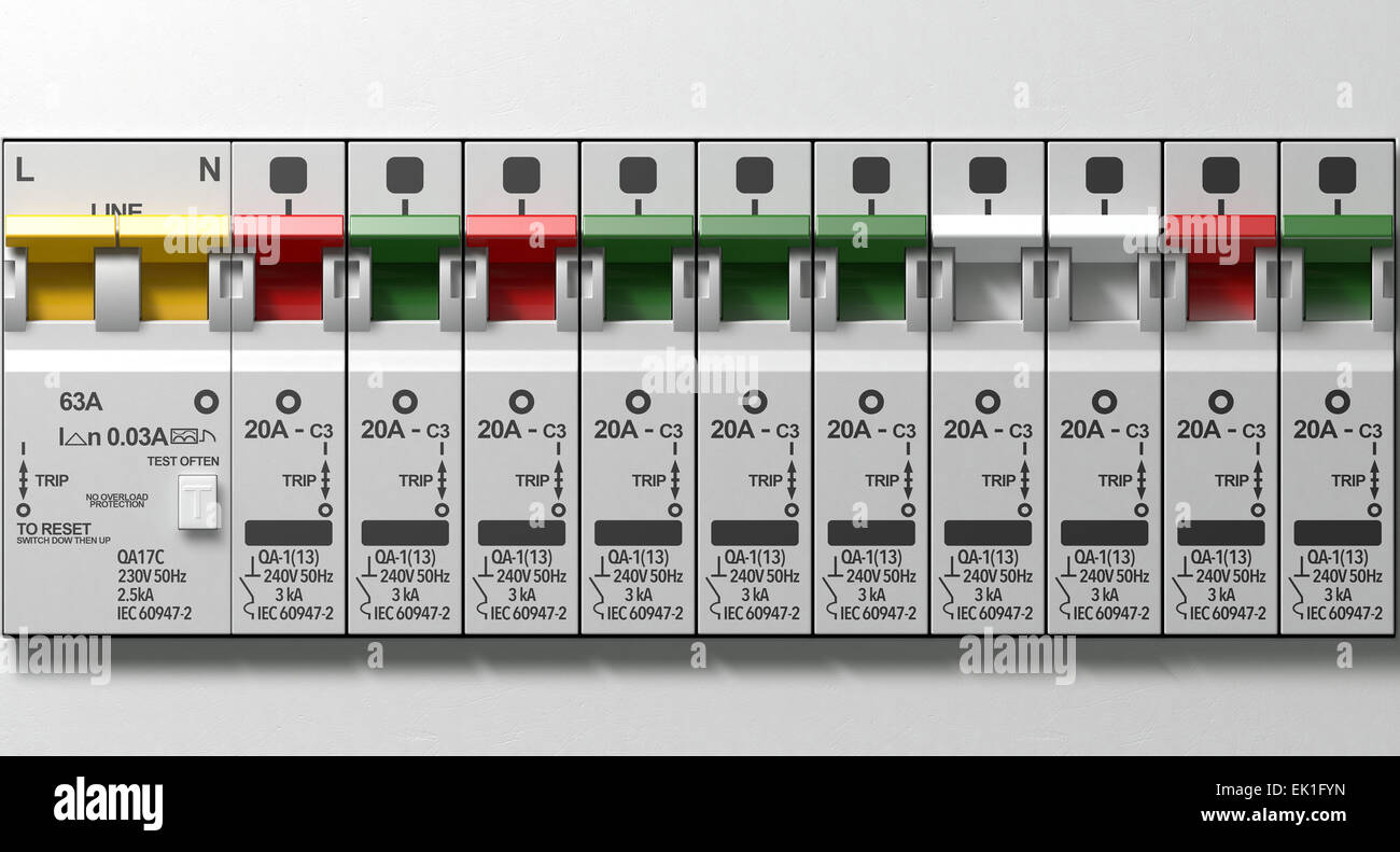 A row of switched on household electrical circuit breakers on a wall ...
