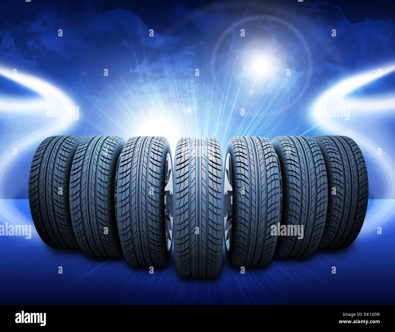 Wedge of car wheels. Abstract blue background Stock Photo - Alamy