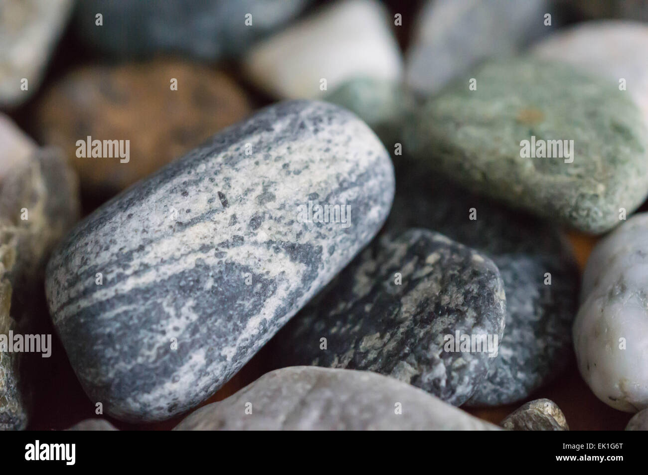 Some scattered pebble close up Stock Photo - Alamy
