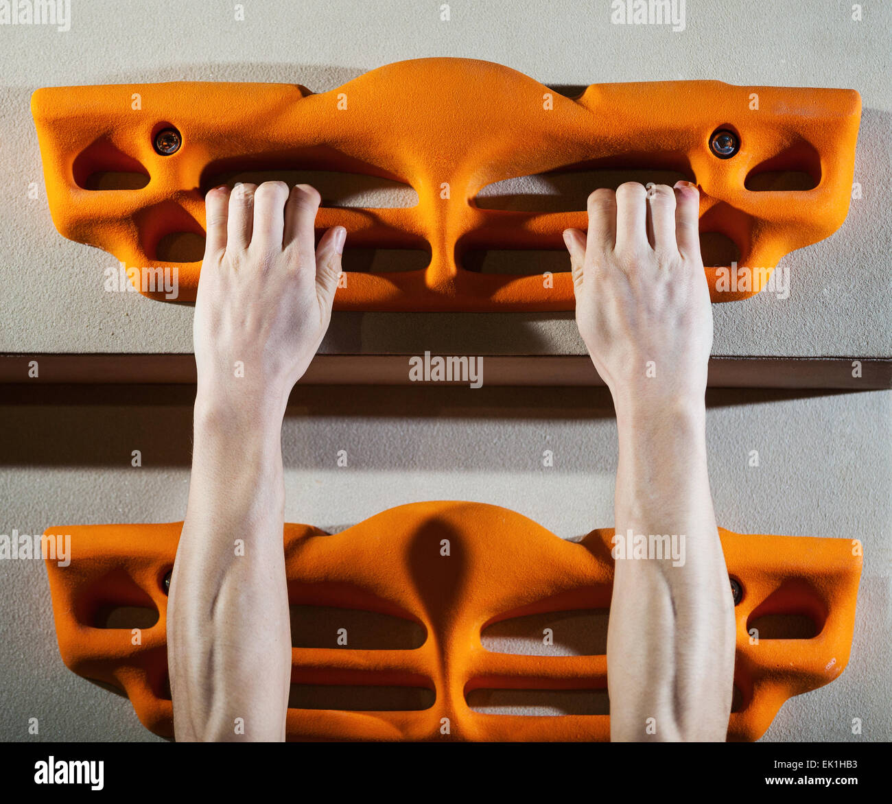 Cropped view of rock climber performing pull-ups on fingerboard Stock ...