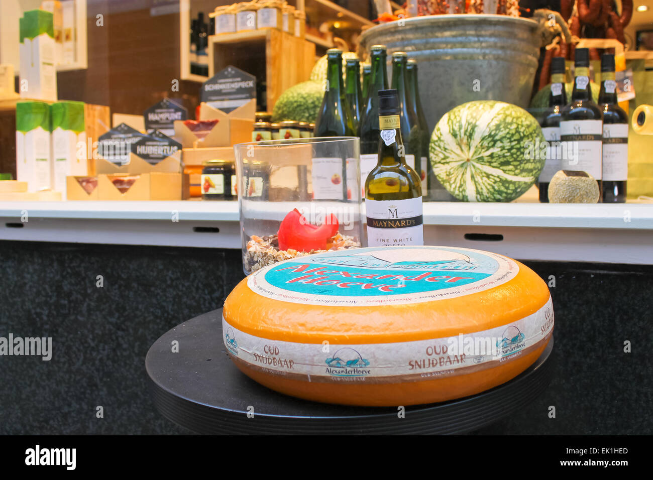 Cheese and wine at the shop window Stock Photo - Alamy