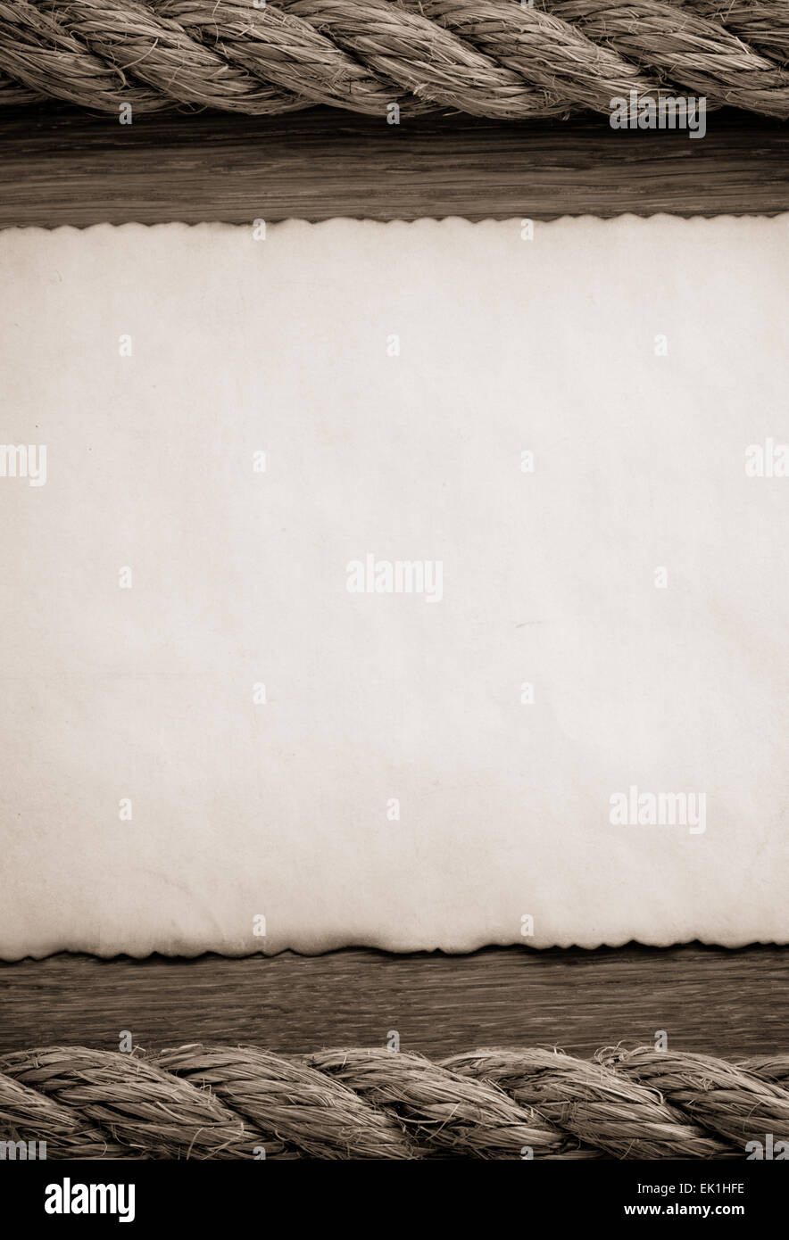 ropes and old vintage ancient paper at wood background Stock Photo - Alamy