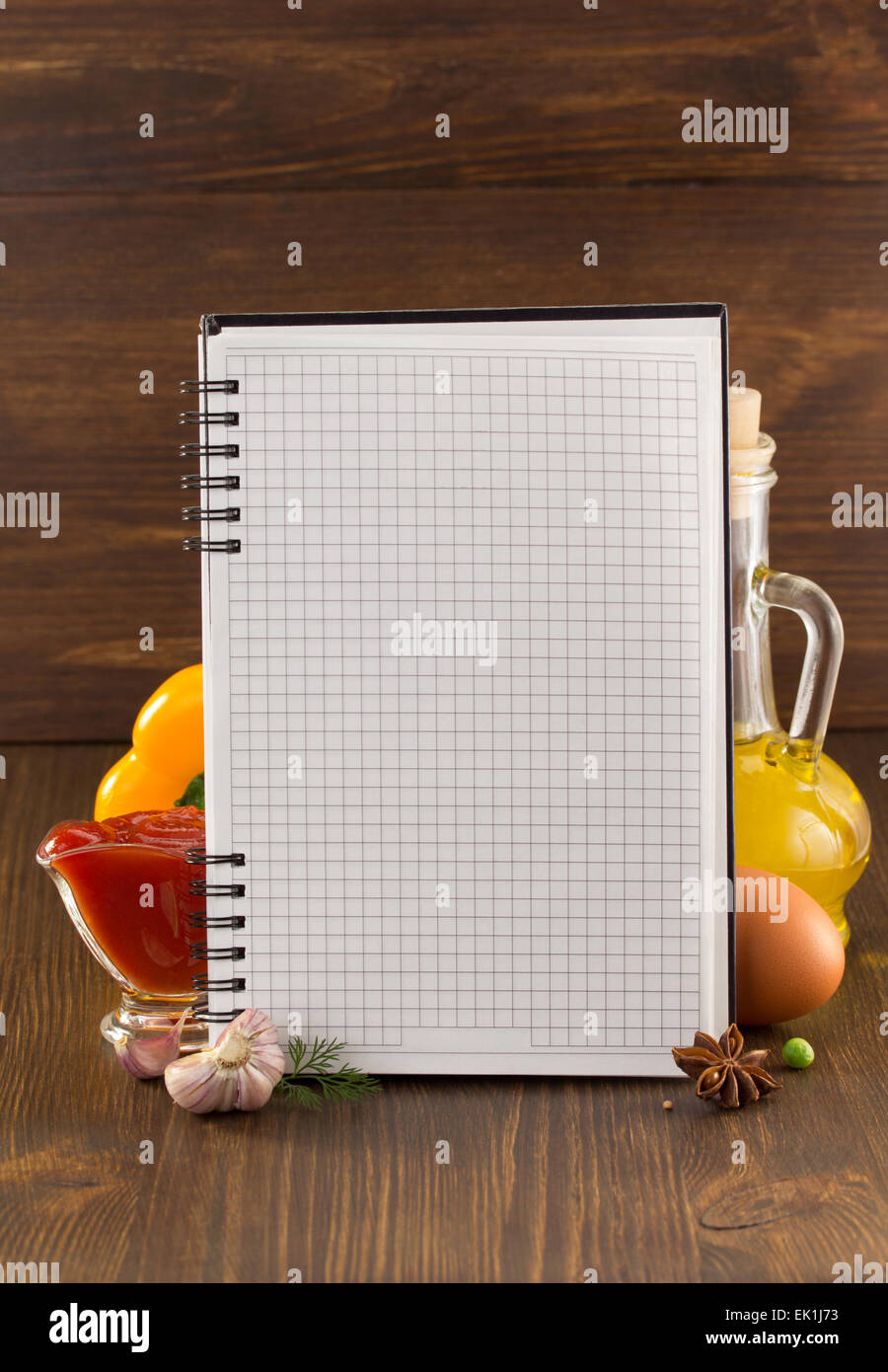 food spice and cookbook on wooden background Stock Photo - Alamy