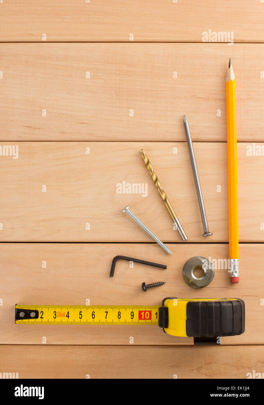 construction concept on wooden background Stock Photo - Alamy