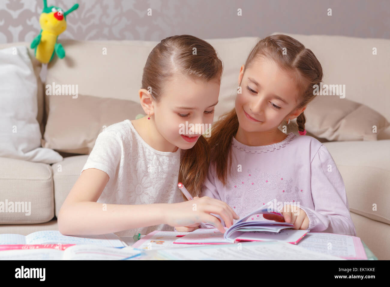 Learn note girls hi-res stock photography and images - Alamy