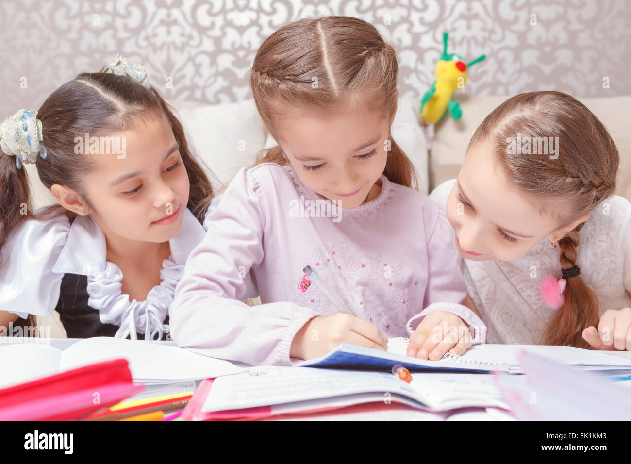 Small girls studying together Stock Photo - Alamy