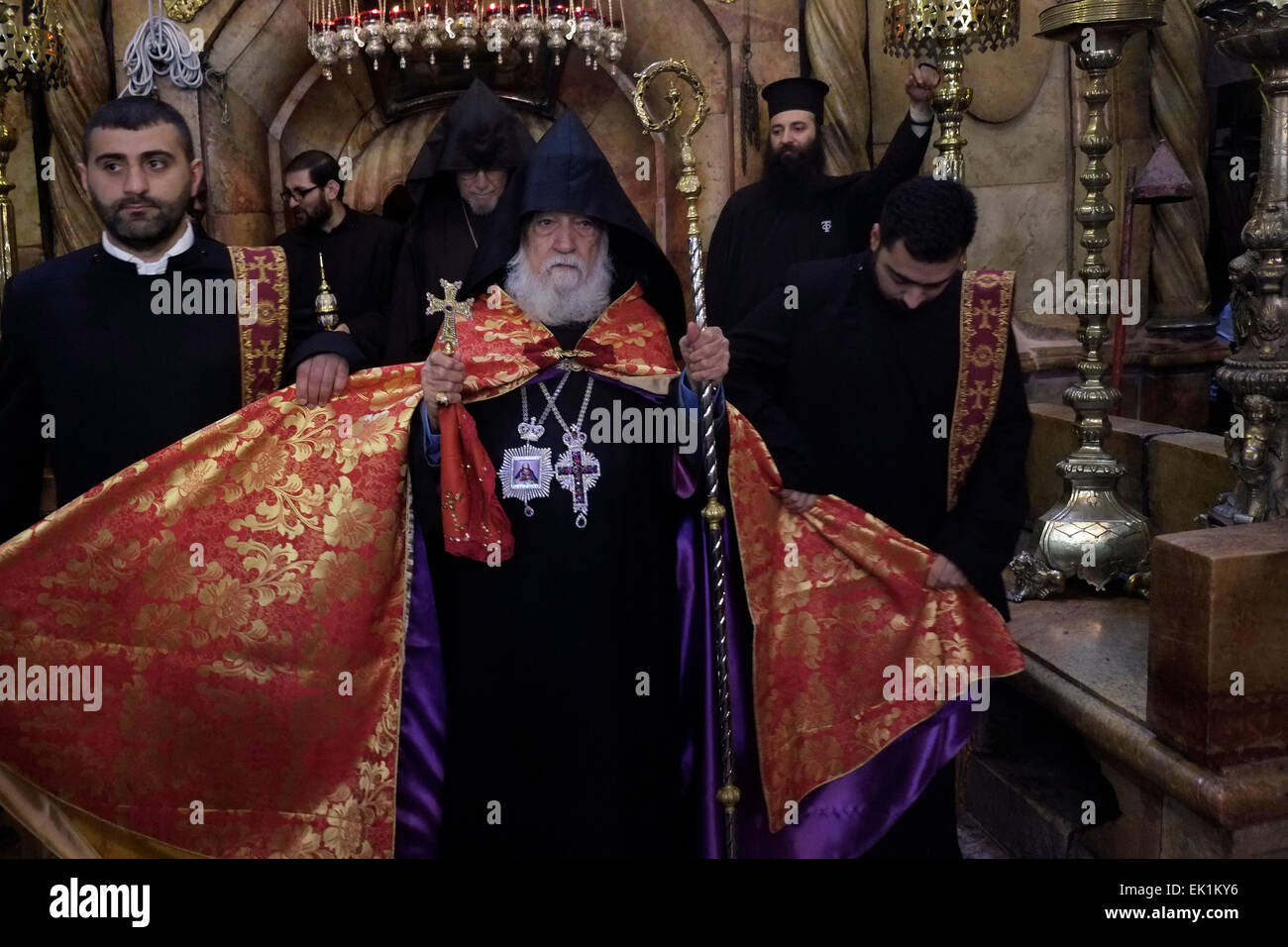 Orthodox Greek clergymen holds an Eastern-style crosier in the shape of ...