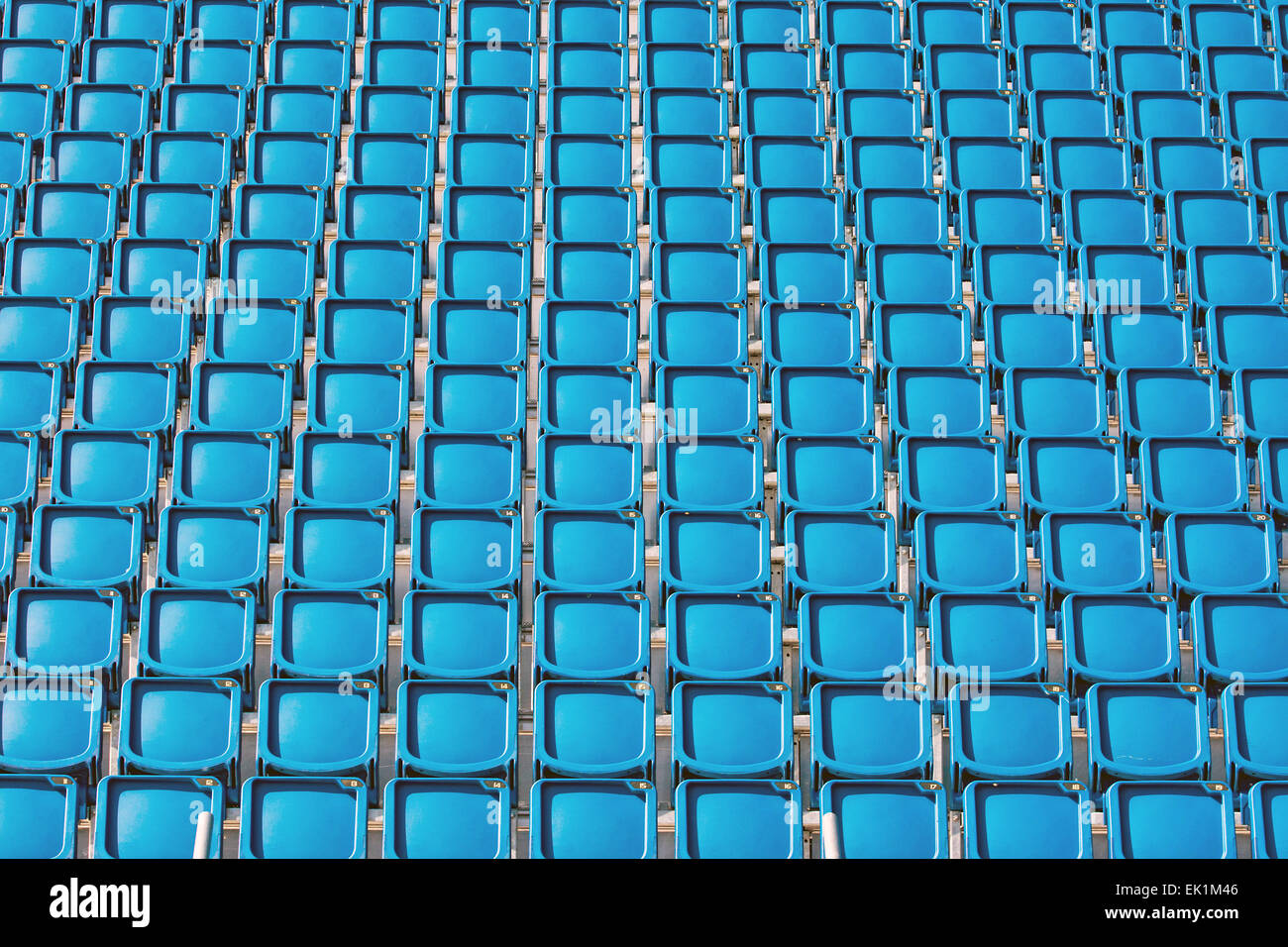 A background from many blue stadium seats Stock Photo - Alamy
