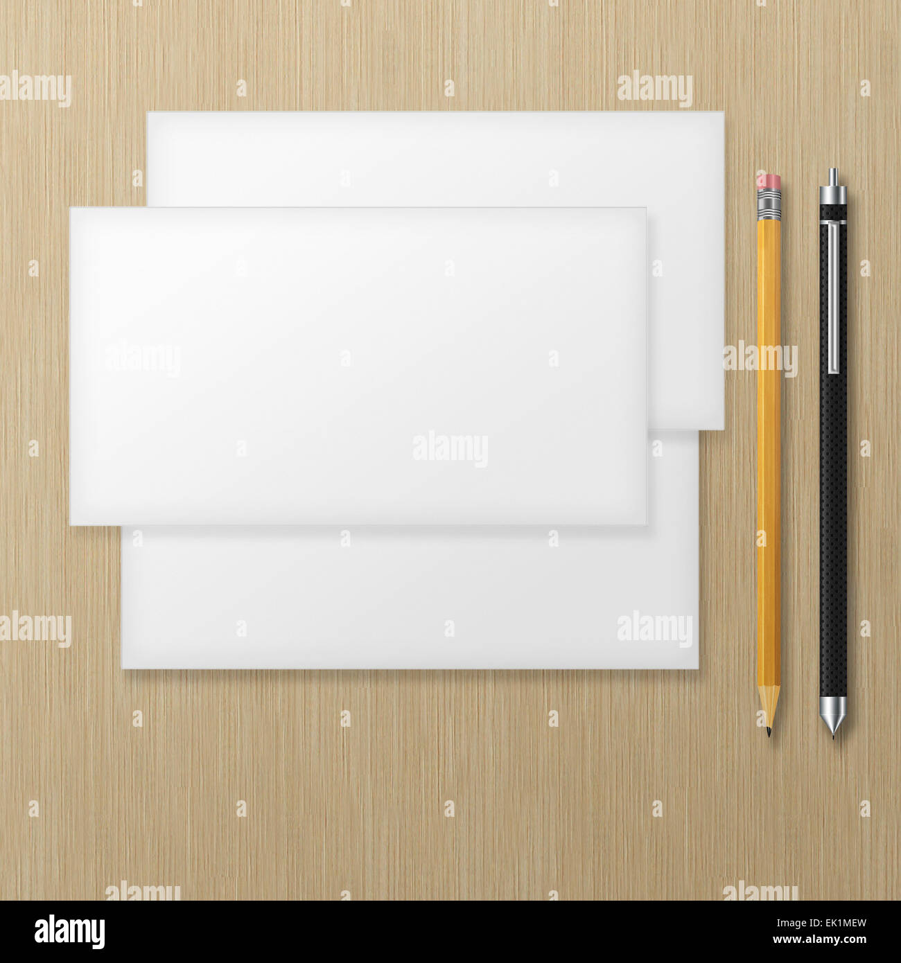 Set of blank envelopes with yellow pencil and pen on wooden background ...