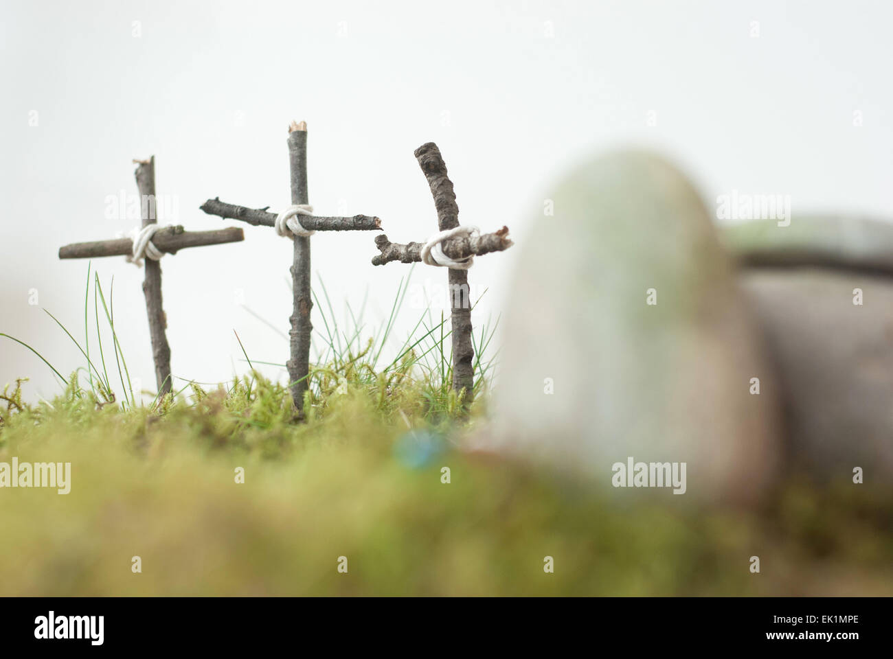 Easter celebration using figures, featuring three crosses and small ...