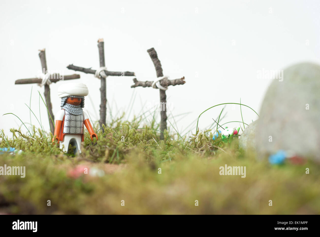 Easter celebration using figures, featuring three crosses and small ...