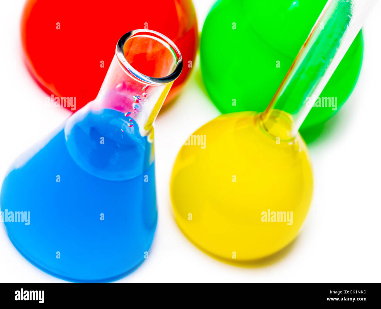 jar with colored reagents closeup on a white background Stock Photo - Alamy