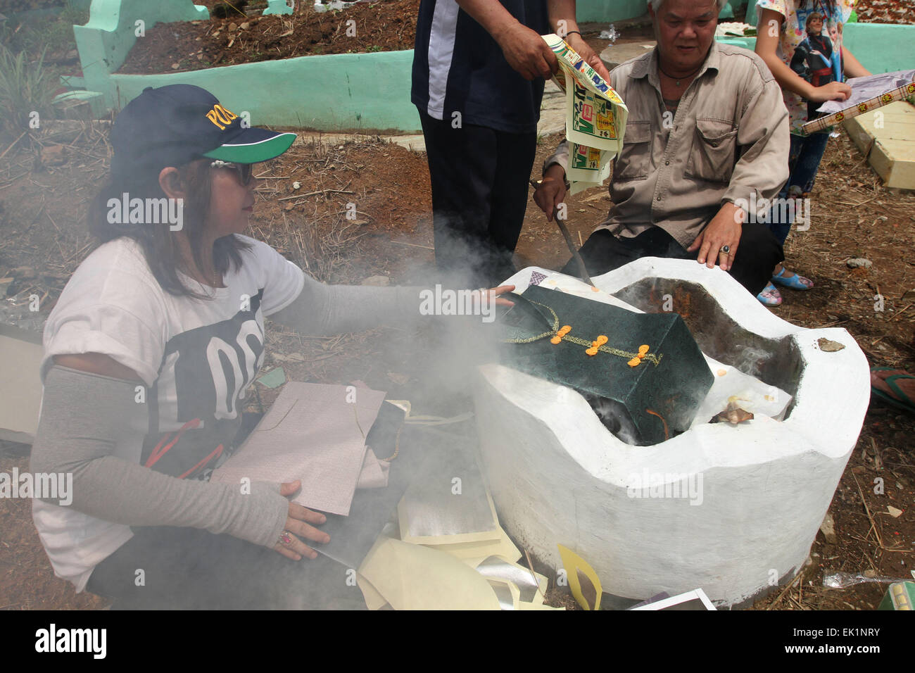 Palembang, Indonesia. 03rd Apr, 2015. A Chinese family are prepared for ...